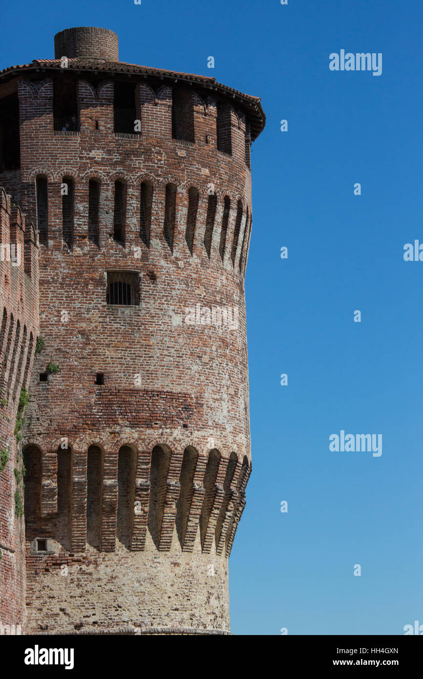 Tower of medieval italian castle on blue sky Stock Photo - Alamy