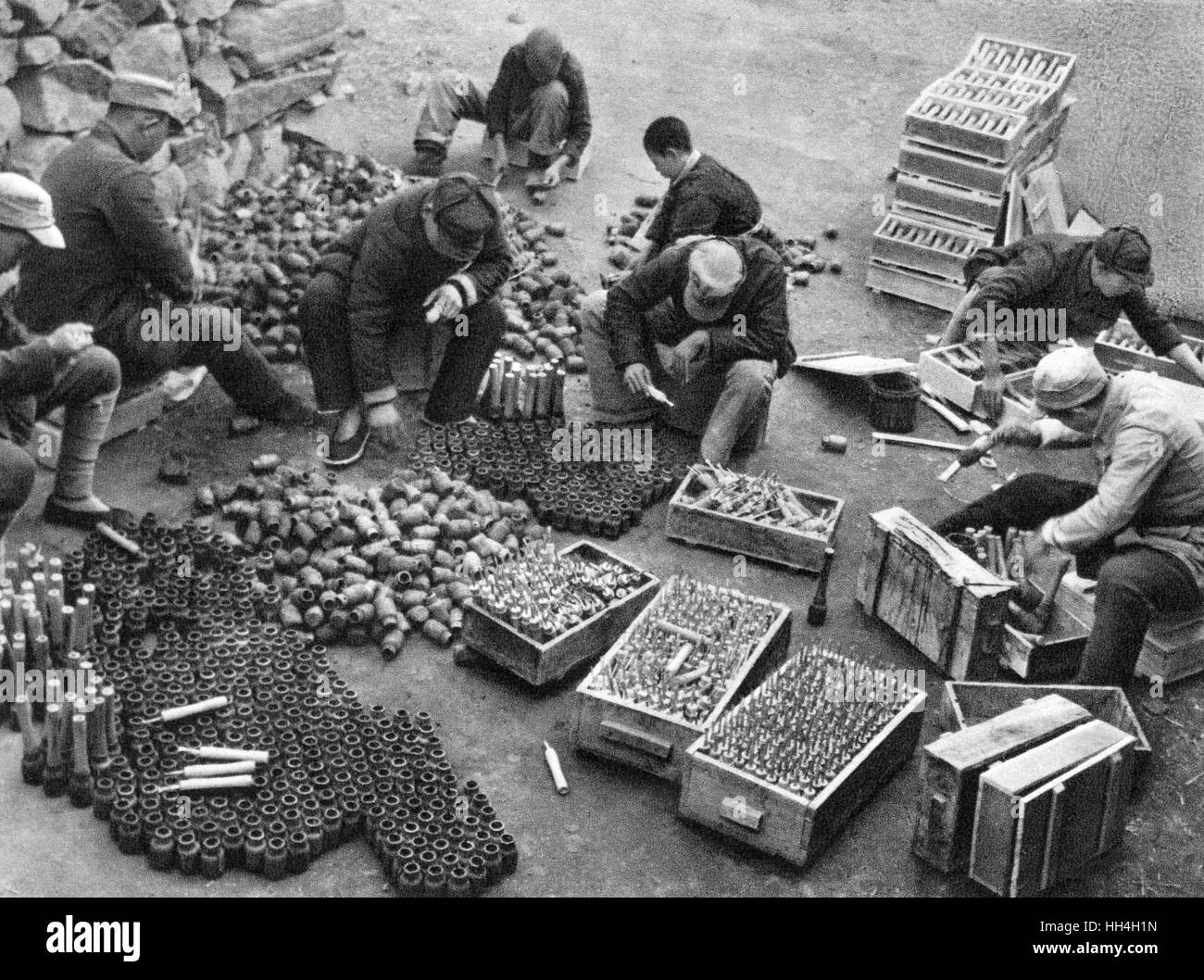Communist China - sorting weapons and ammunition Stock Photo - Alamy