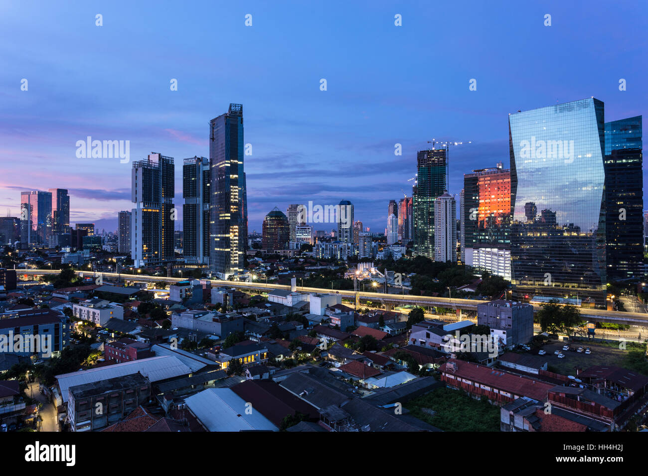Aerial view of sunrise over the Kuningan business district of Jakarta ...
