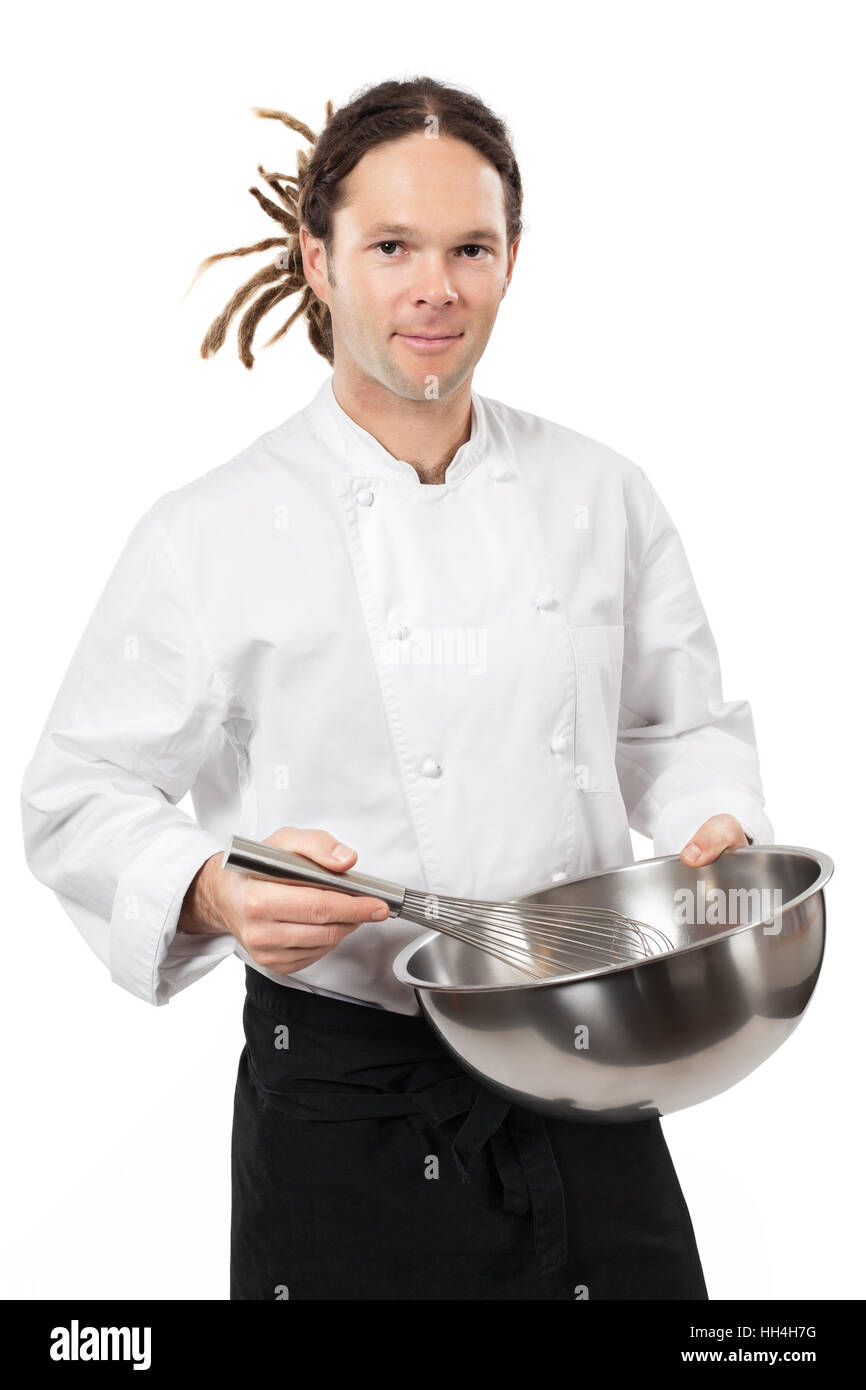 Photo of a young chef with dreadlocks holding a large mixing bowl and ...
