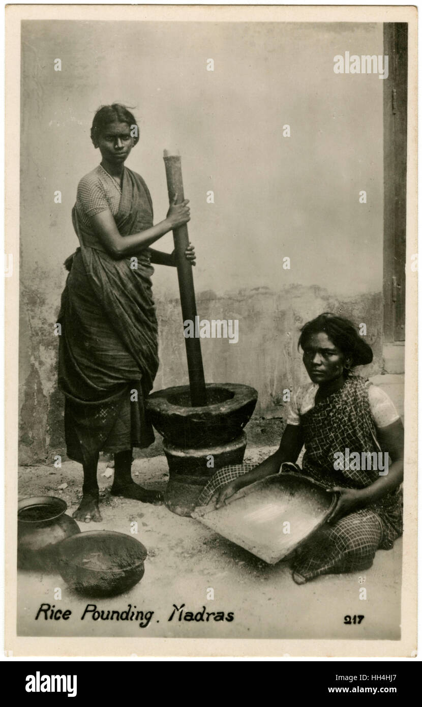 Woman grinding rice hi-res stock photography and images - Alamy