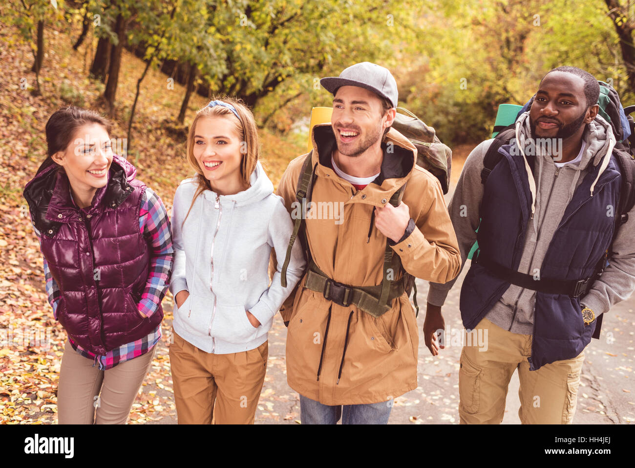 Happy men tourists walking hi-res stock photography and images - Alamy