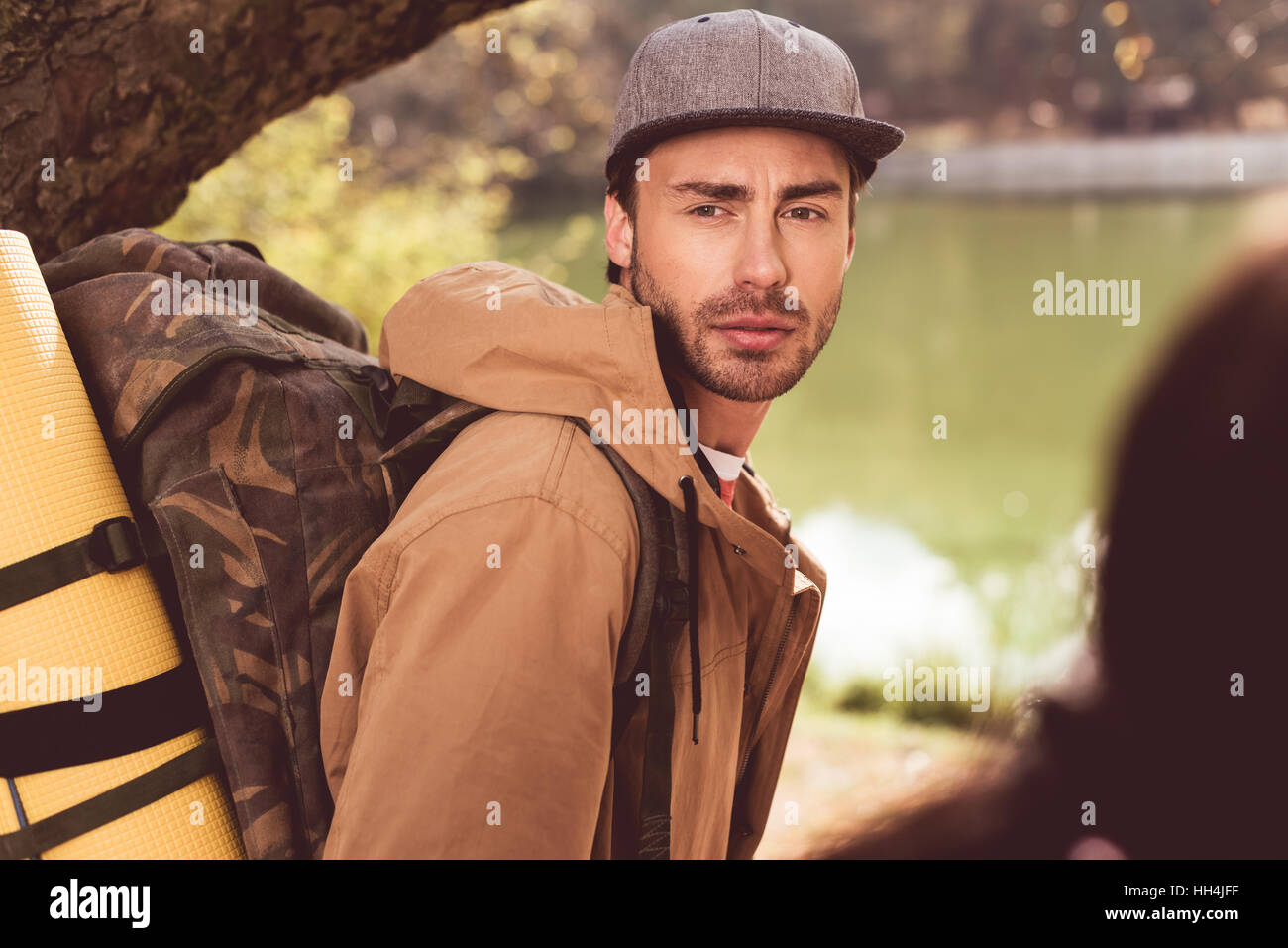 Man standing under tree hi-res stock photography and images - Alamy