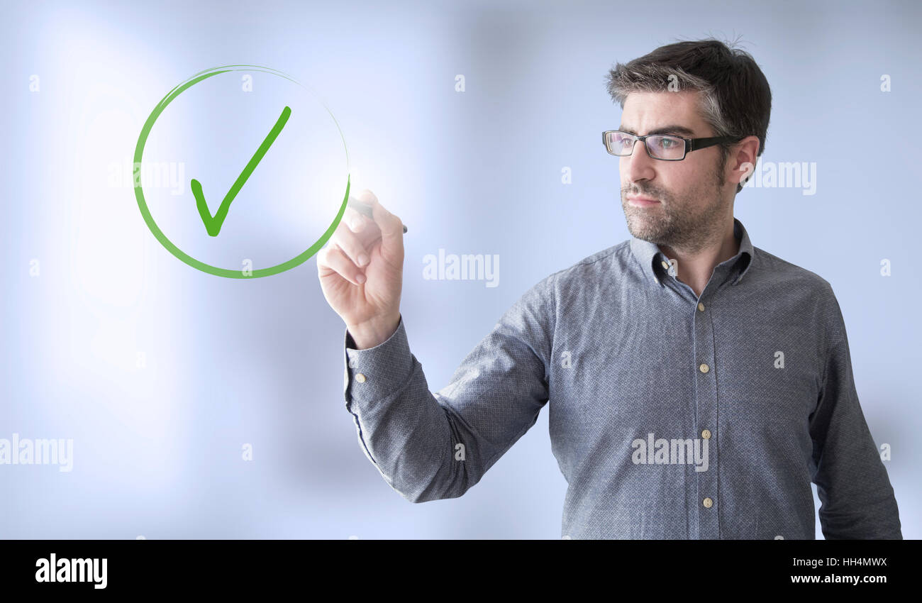 businessman sketchng check mark Stock Photo - Alamy