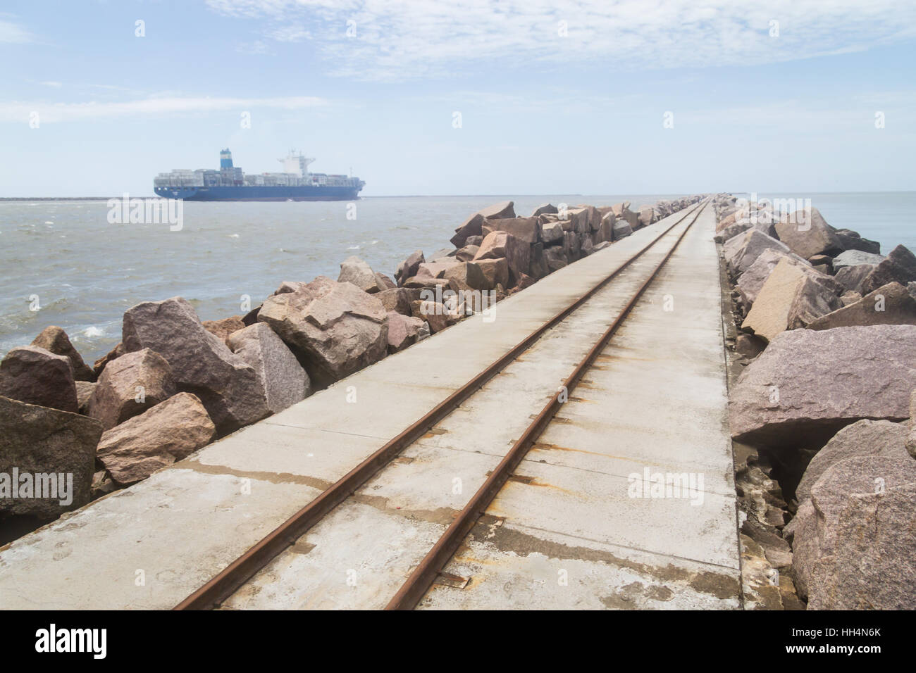 Ship navigating to the ocean using Rio Grande channel and breakwater at ...