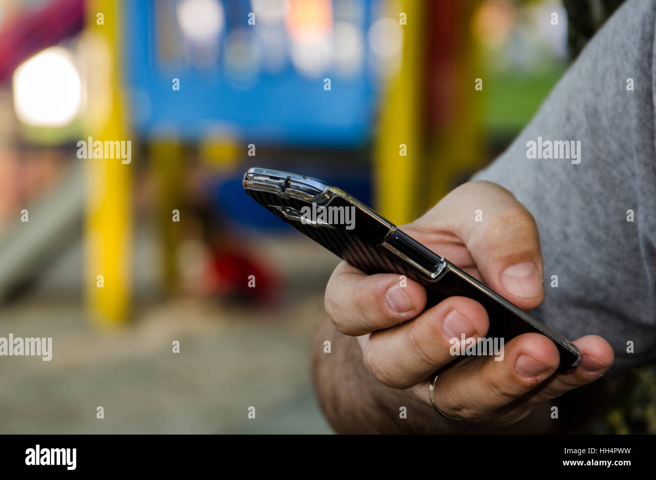 Man is texting on the mobile phone - Close up of man`s hand Stock Photo ...