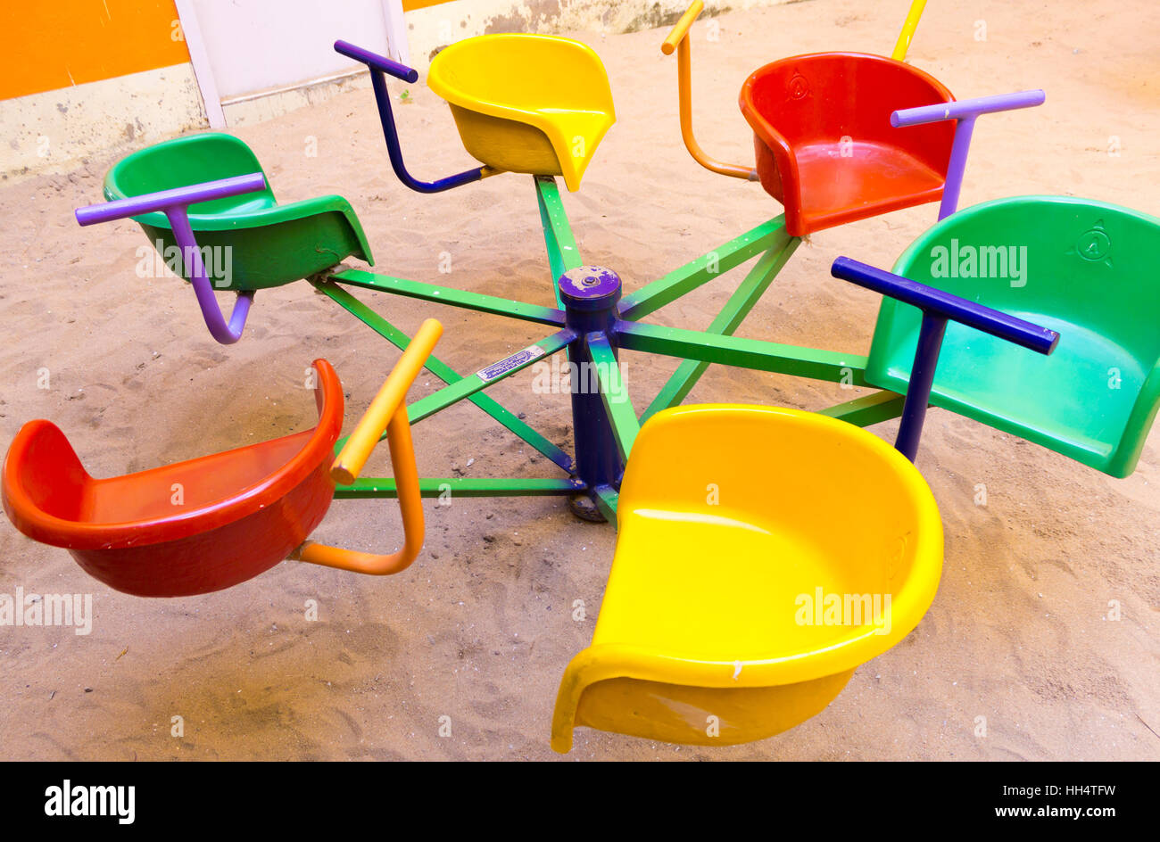 Children merry go round playground hi-res stock photography and images ...