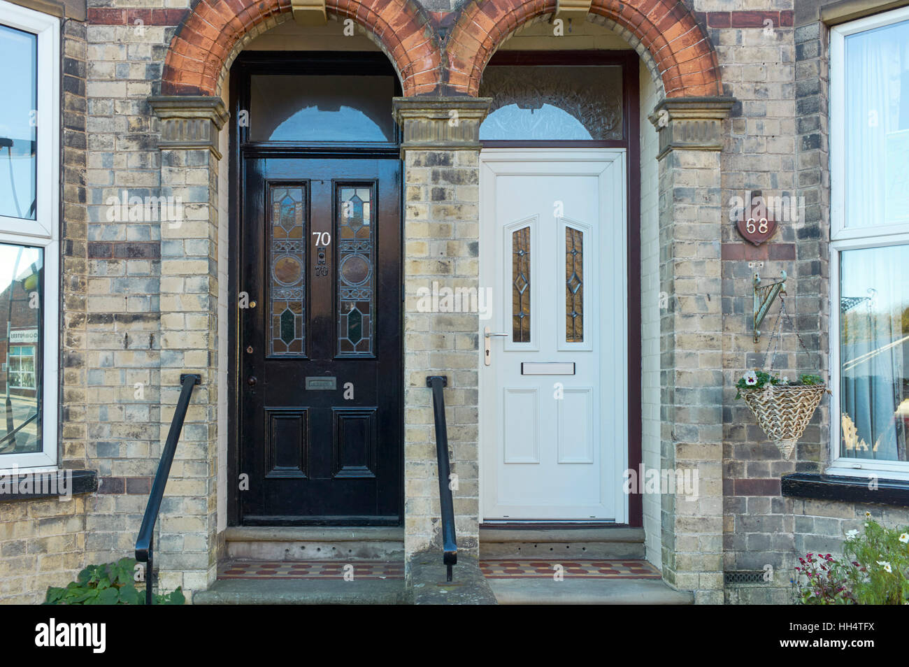 Inappropriate front doors Stock Photo - Alamy