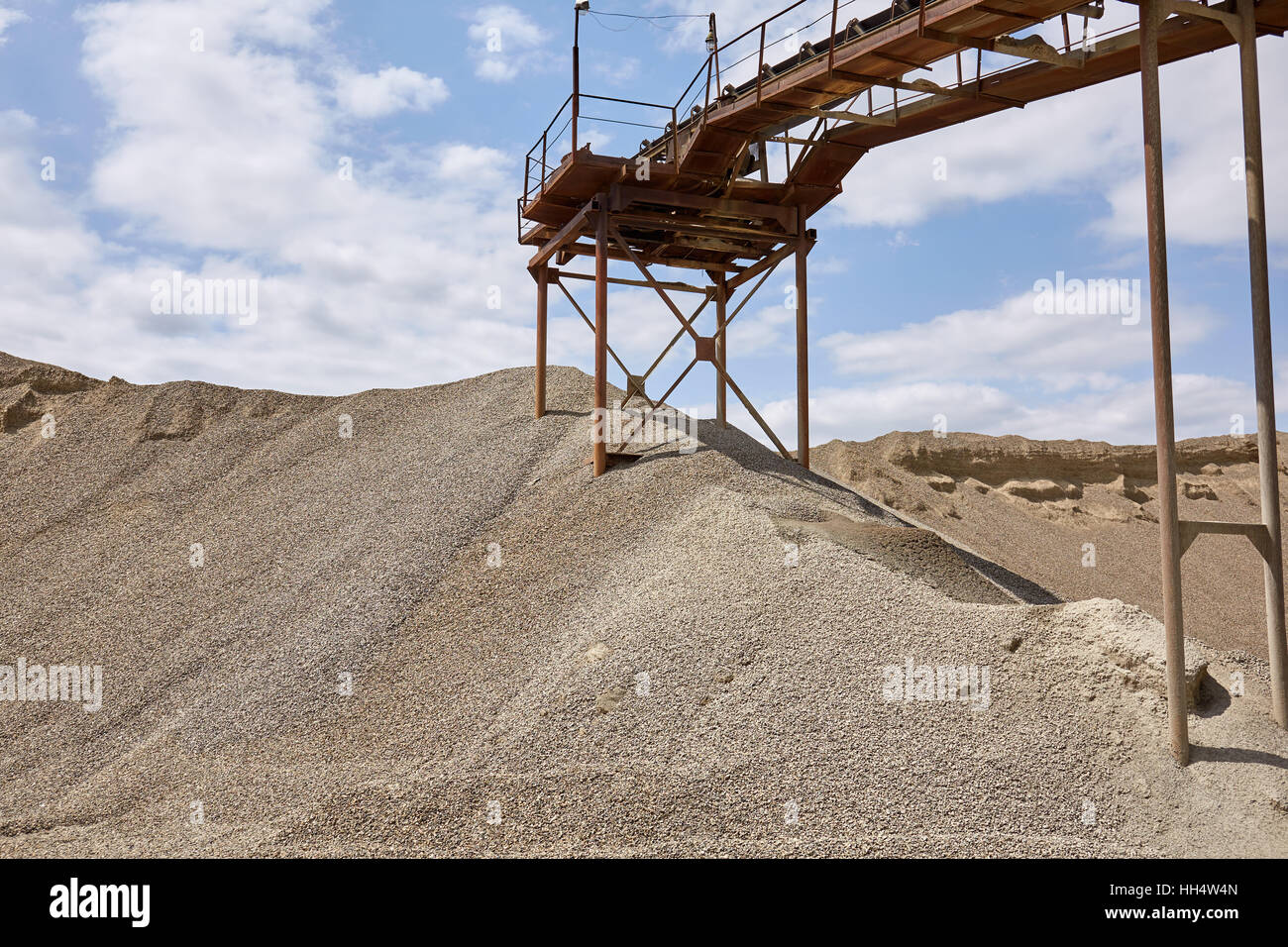 Conveyor belt of stone crushing plant Stock Photo - Alamy