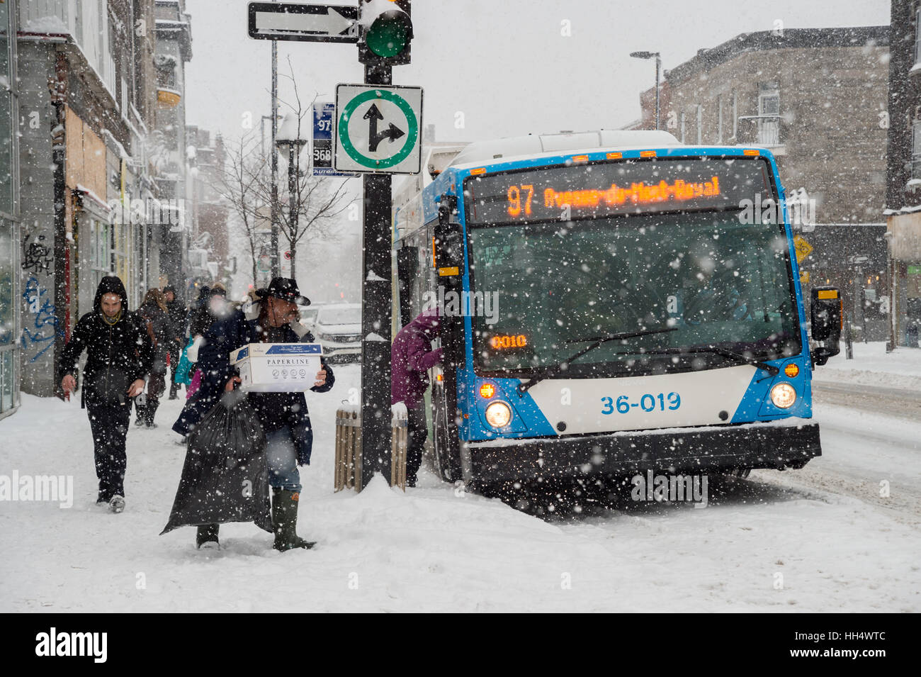 Montreal, CA - 29 December 2016: Commuters boarding a STM bus during ...