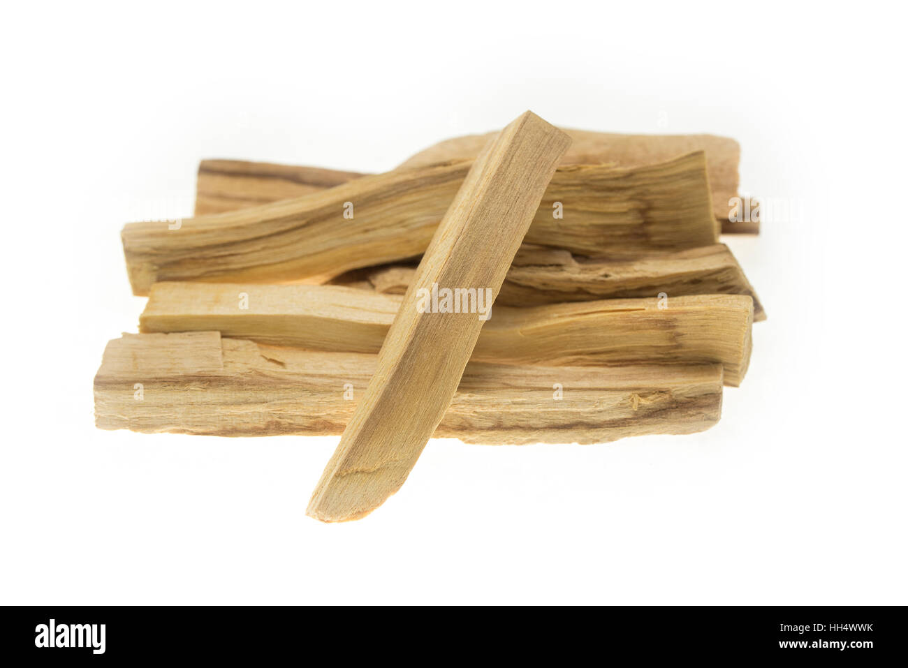 Pile of aromatic holy wood or palo santo isolated on white background ...
