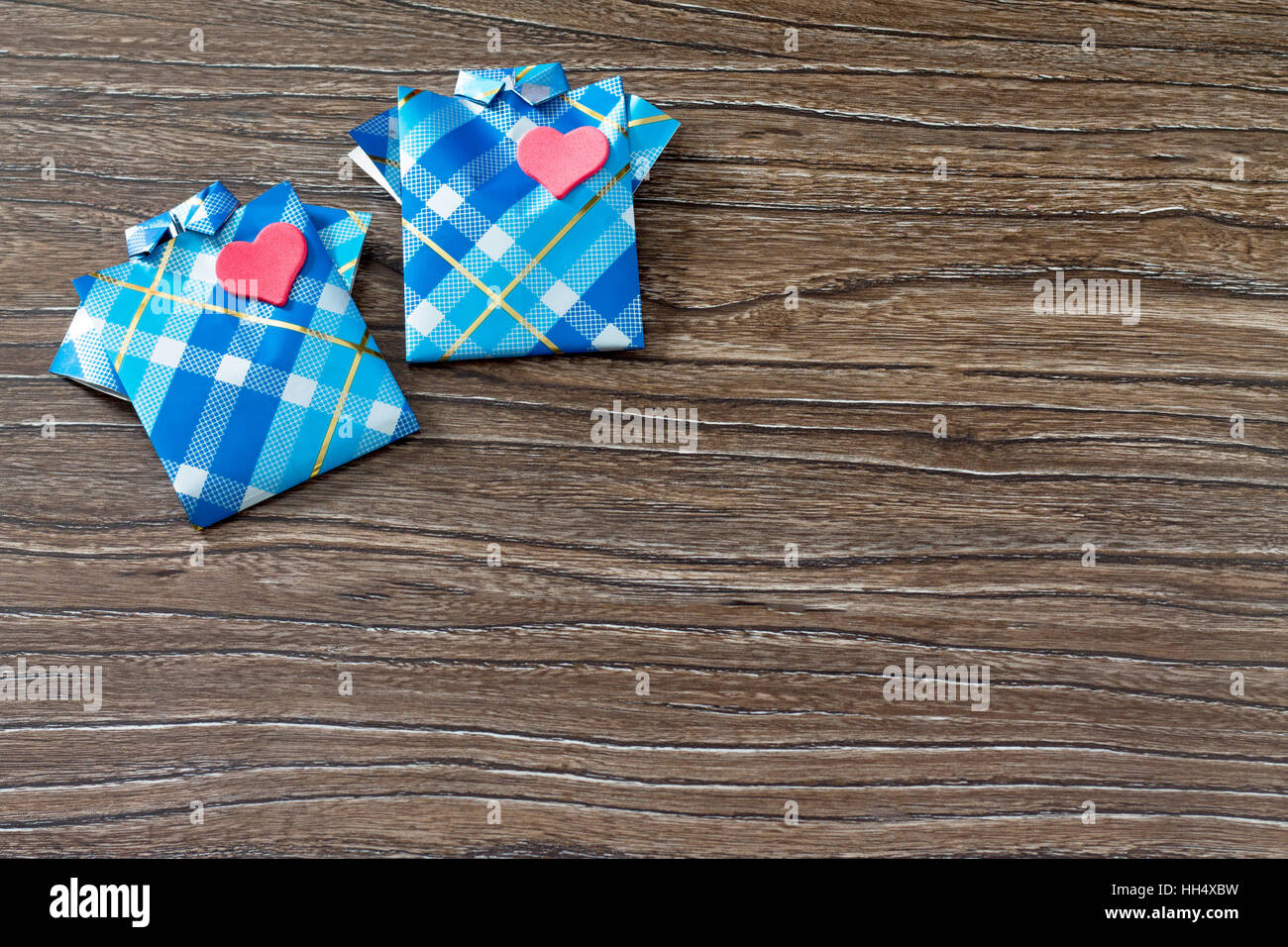 Gift for Father's Day background, copy space. The child makes a gift of ...