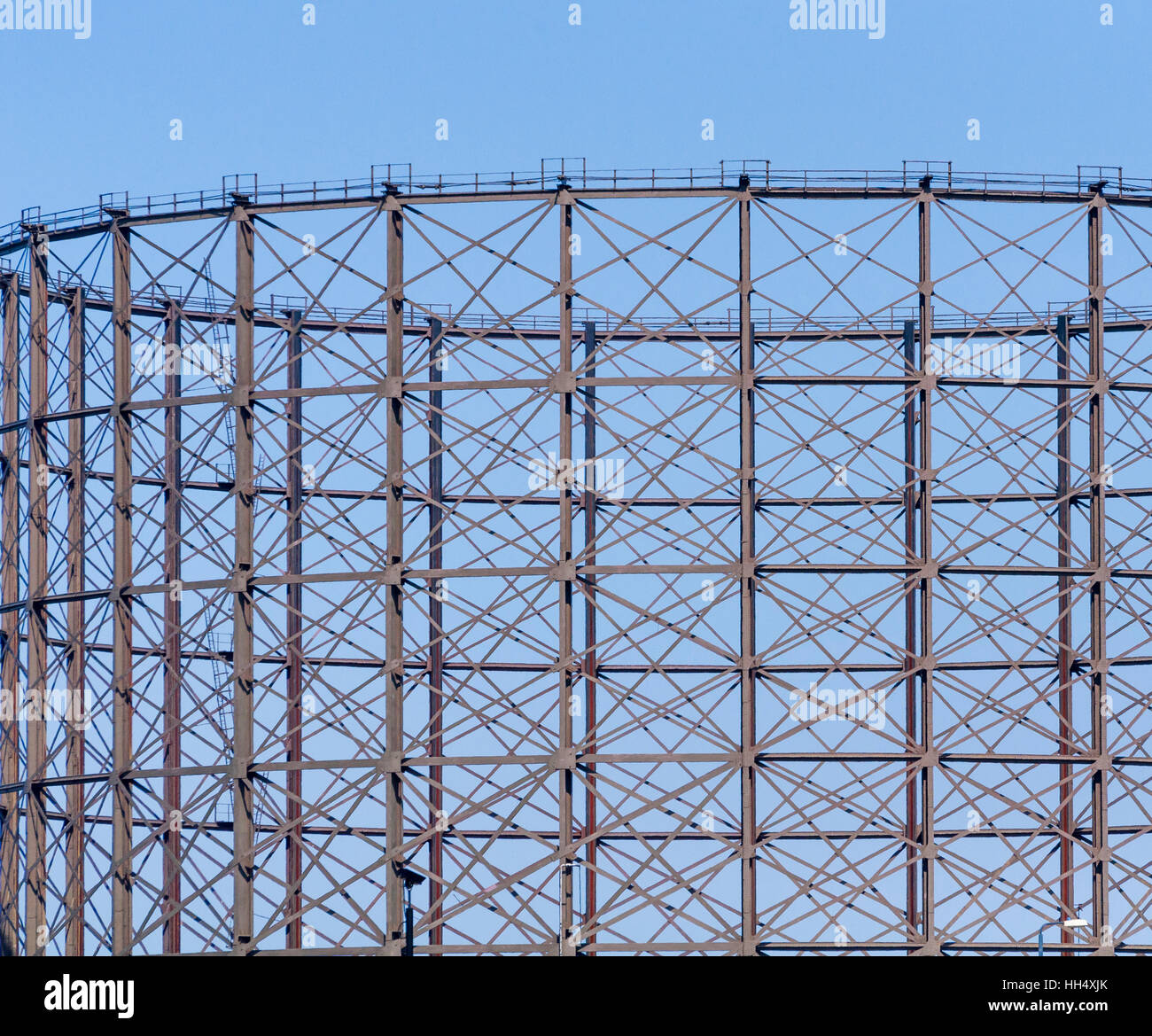 A gas storage tank's steel structure forms an abstract geometric ...