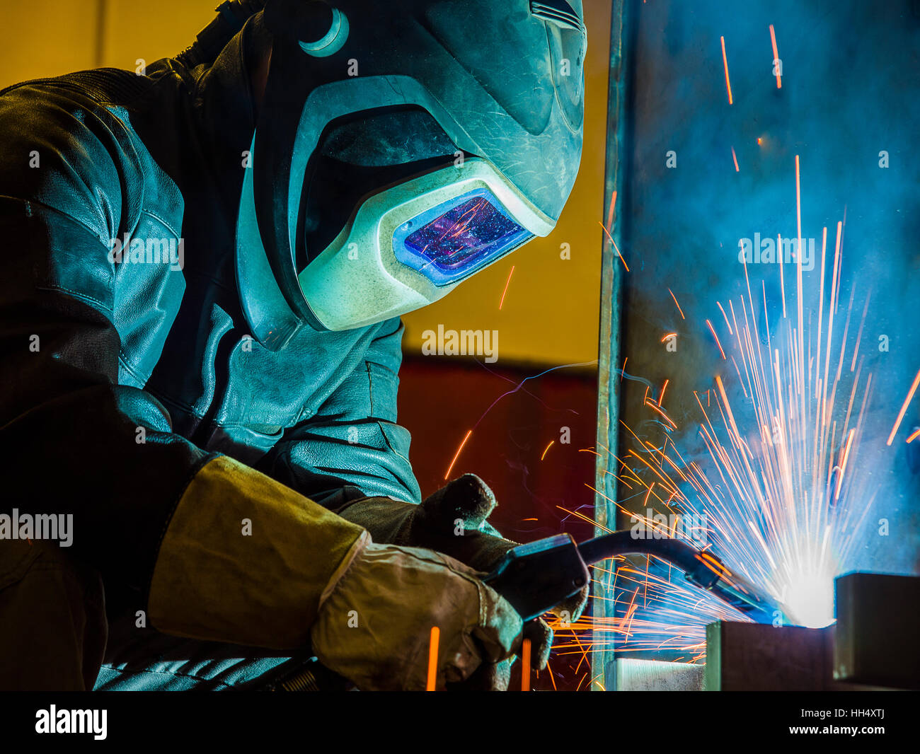 welder, craftsman, erecting technical steel Industrial steel welder in ...