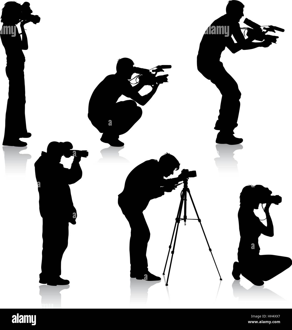 Set cameraman with video camera. Silhouettes on white background ...