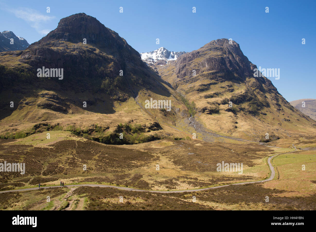 Glencoe Scotland UK in spring with blue sky snow and sunshine tourist ...