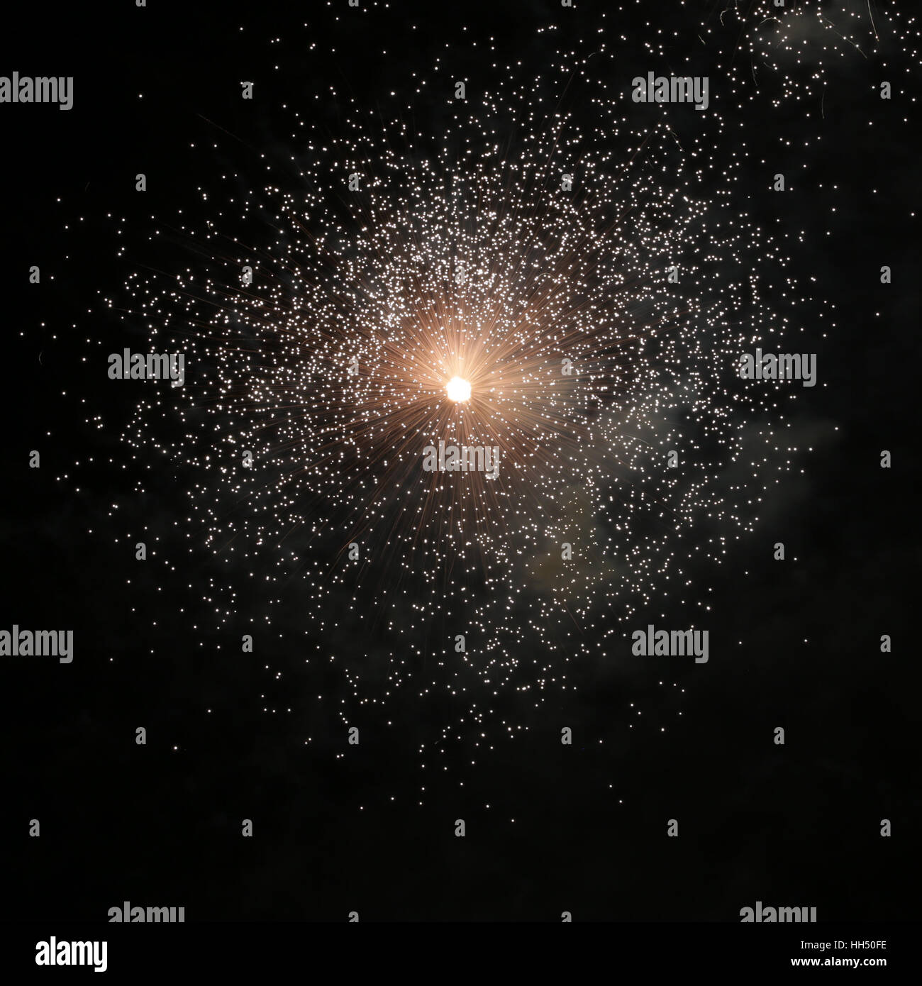 Colorful fireworks explosion in a dark night Stock Photo - Alamy