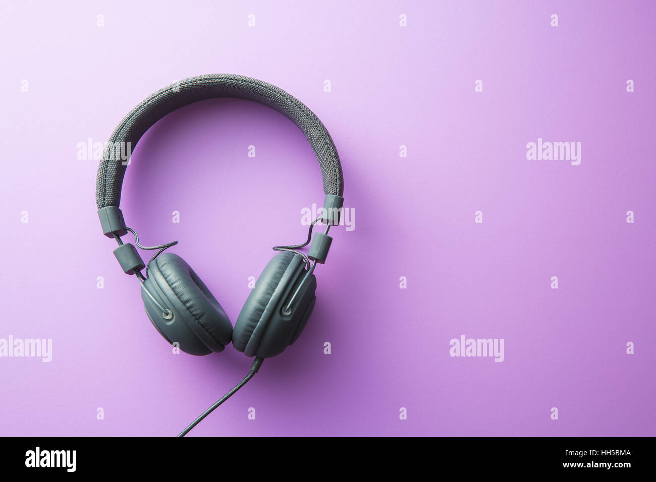 Gray vintage headphones. Top view Stock Photo - Alamy