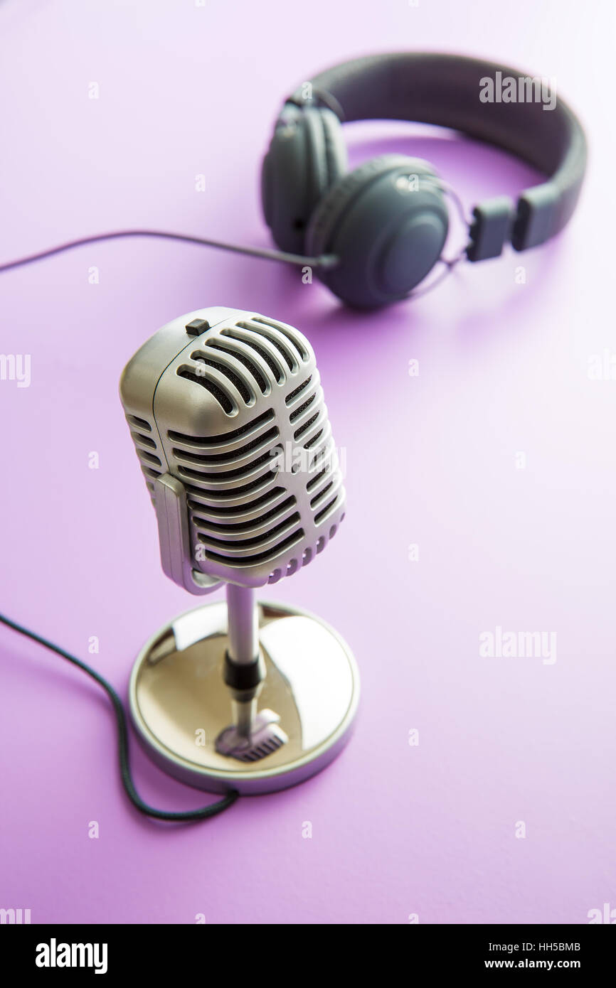 the vintage silver microphone and headphones Stock Photo - Alamy