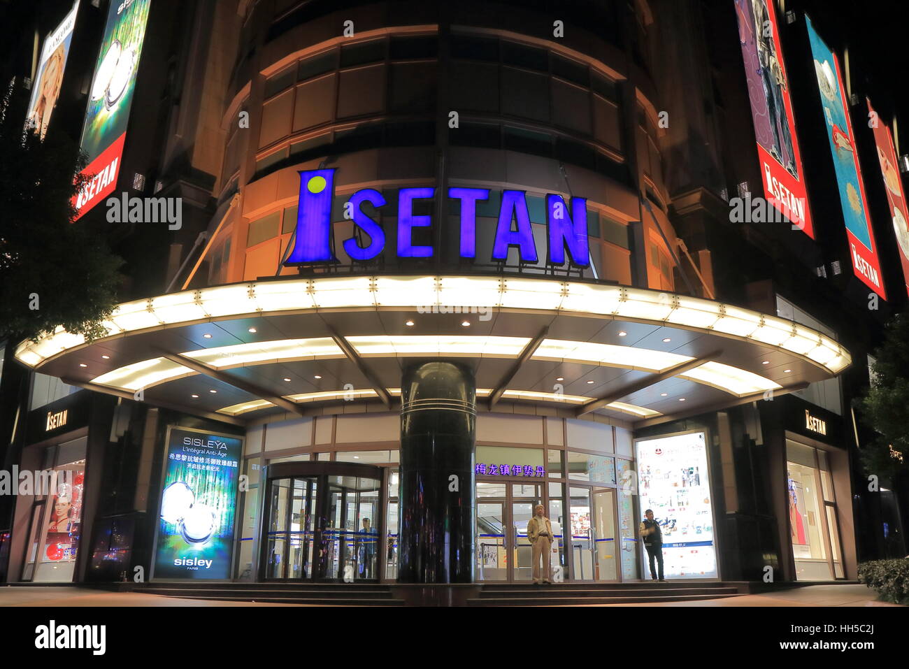 People visit Isetan department store in Shanghai China. Isetan is a ...