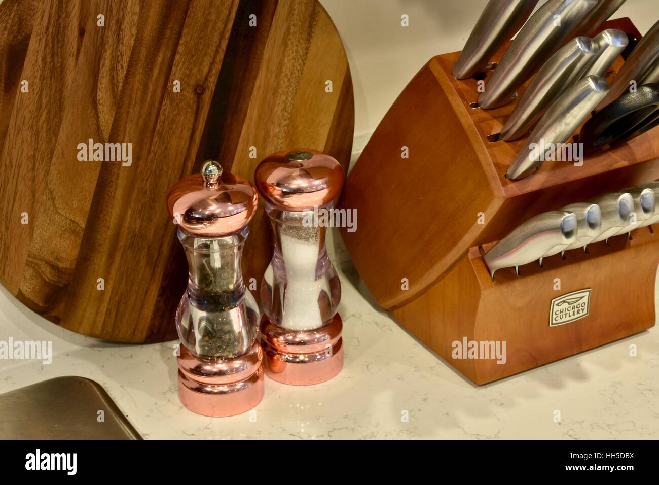 Modern kitchen counter with knife set, salt and pepper shaker, and a ...