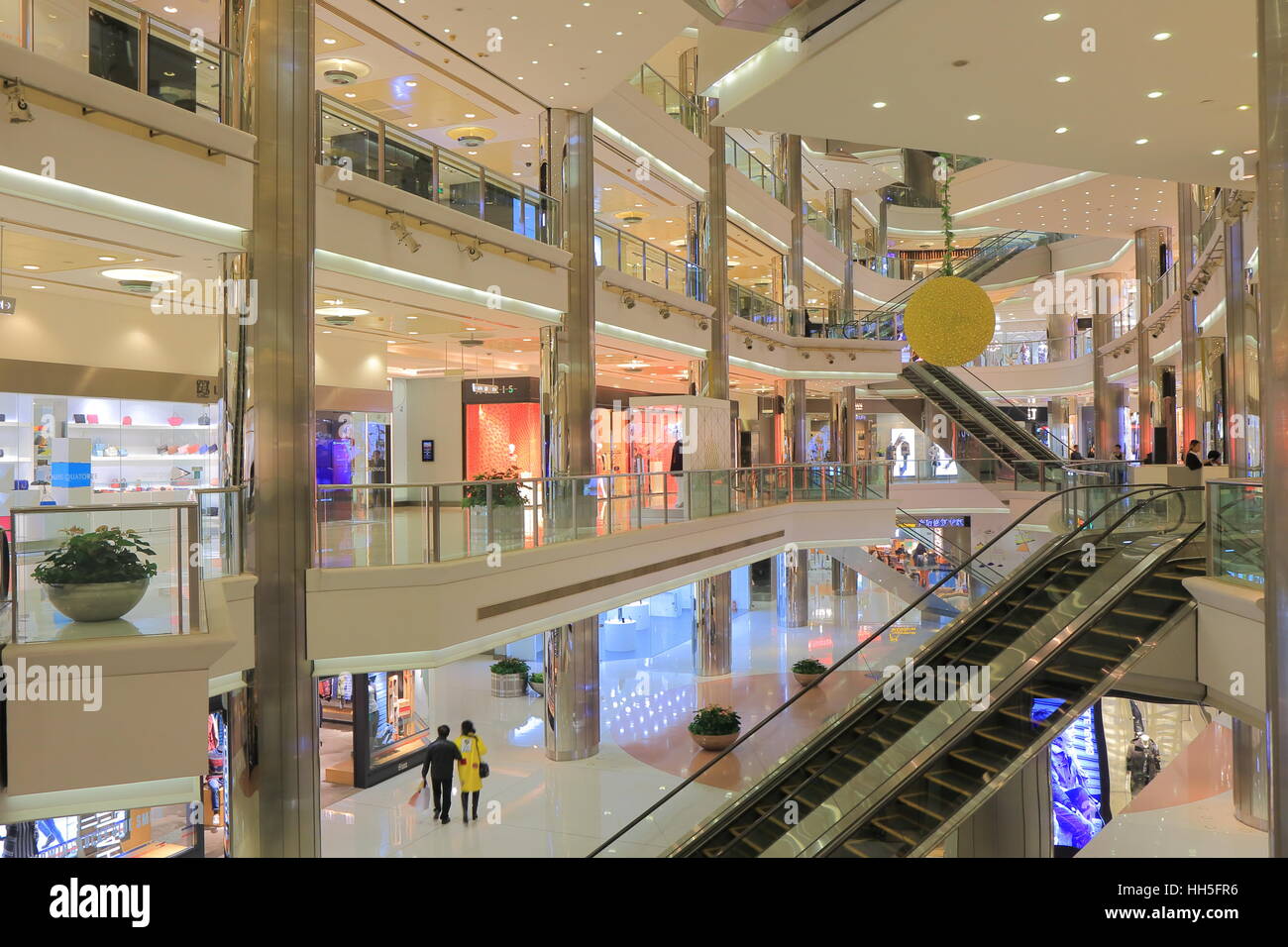 People visit CITIC Square shopping mall Nanjing Road West in Shanghai ...