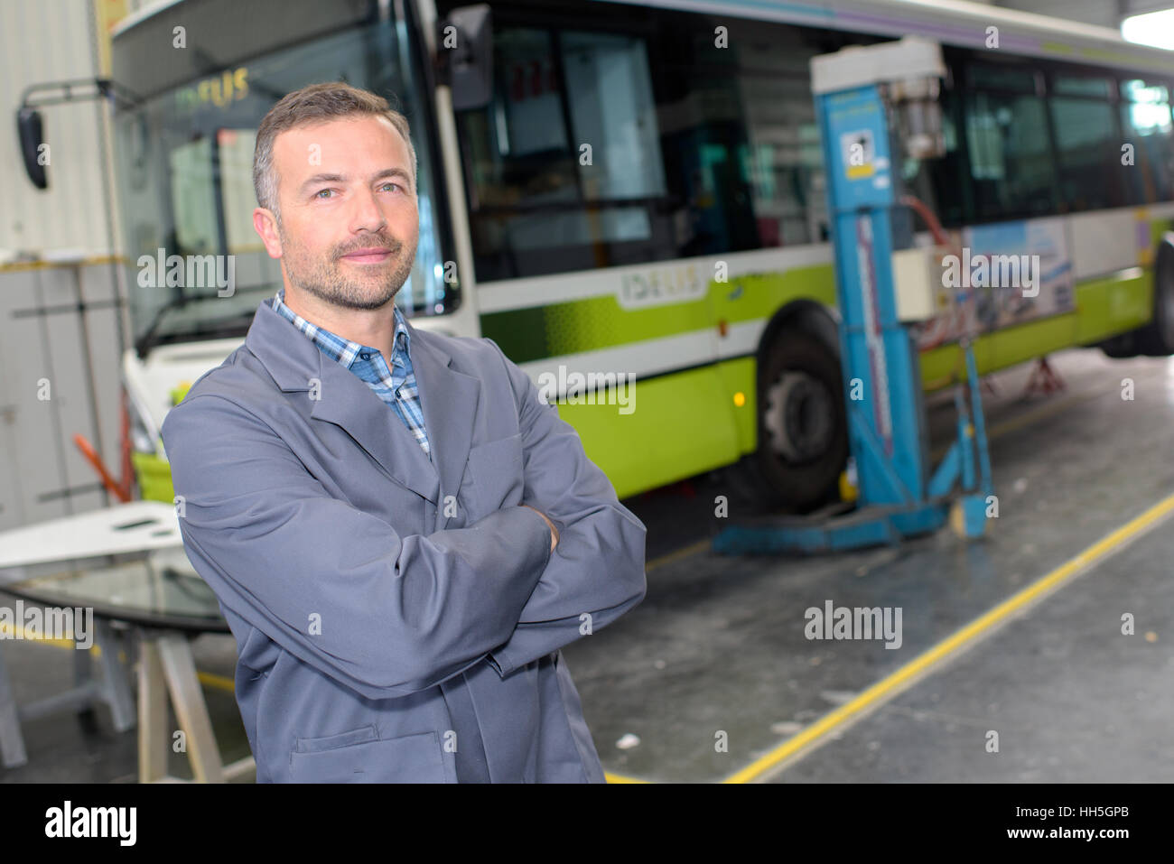 Handsome young man bus stop hi-res stock photography and images - Alamy