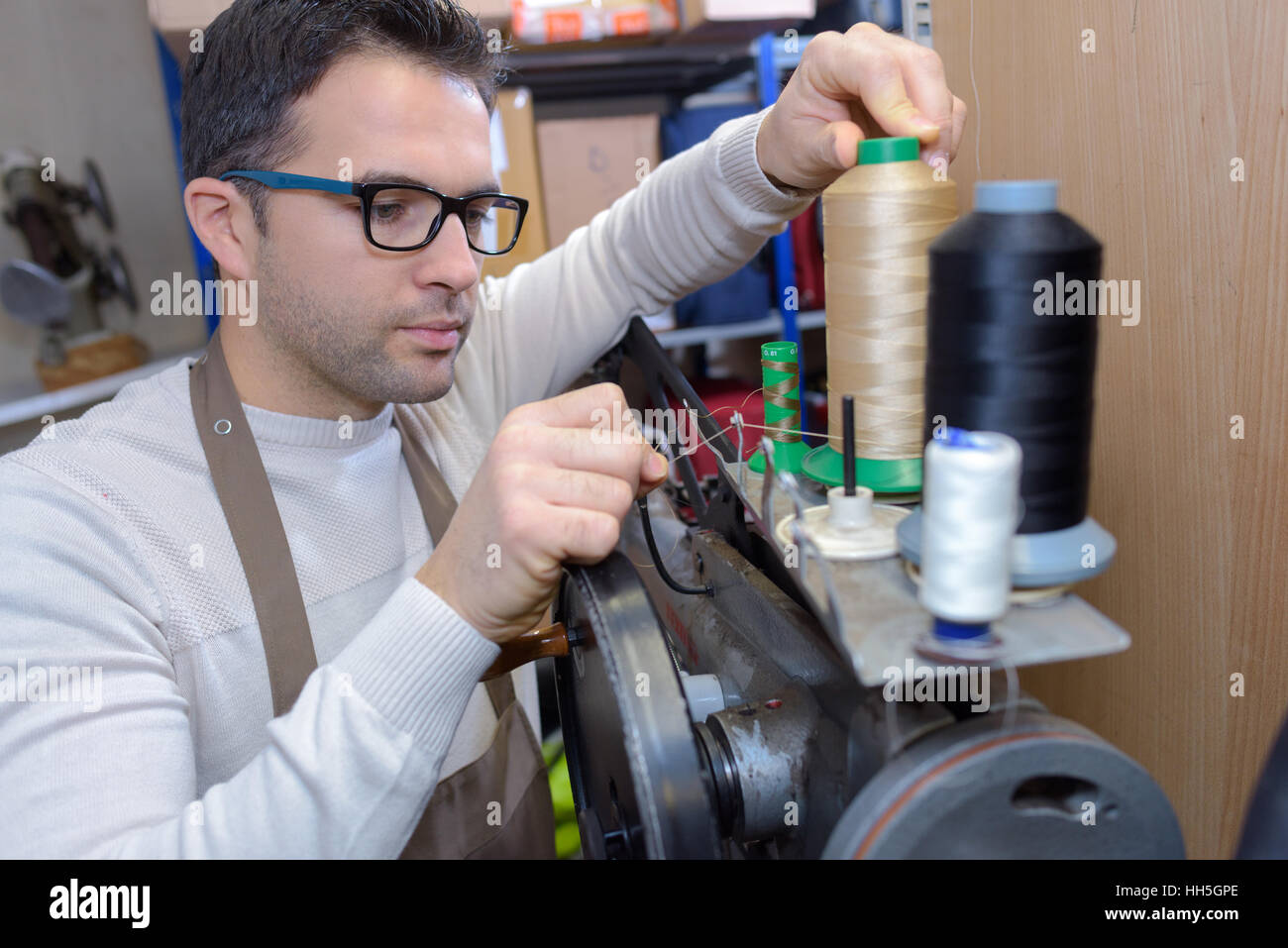 Cobbler work sewing machine hi-res stock photography and images - Alamy