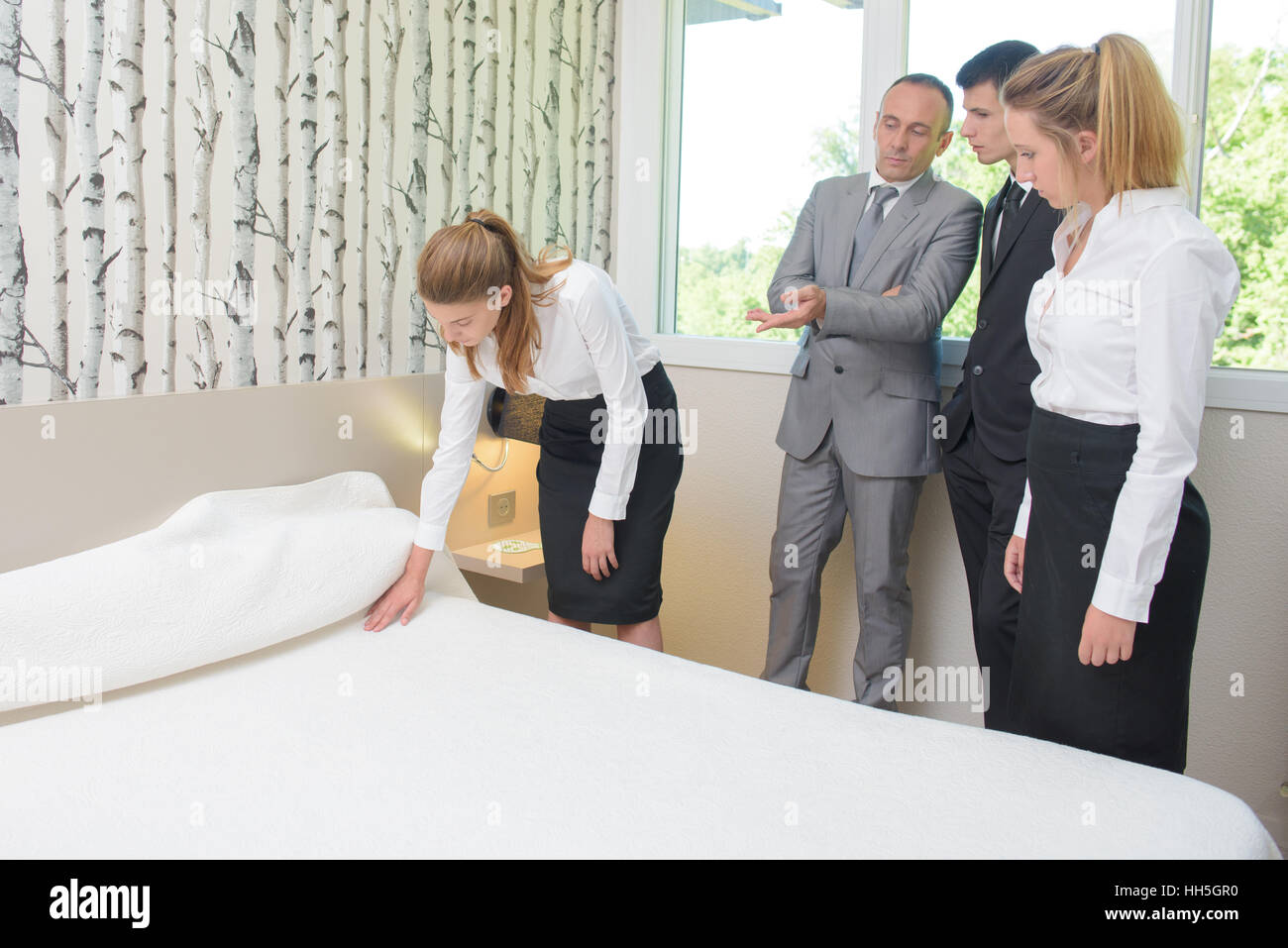 Worker training by supervisor hi-res stock photography and images - Alamy