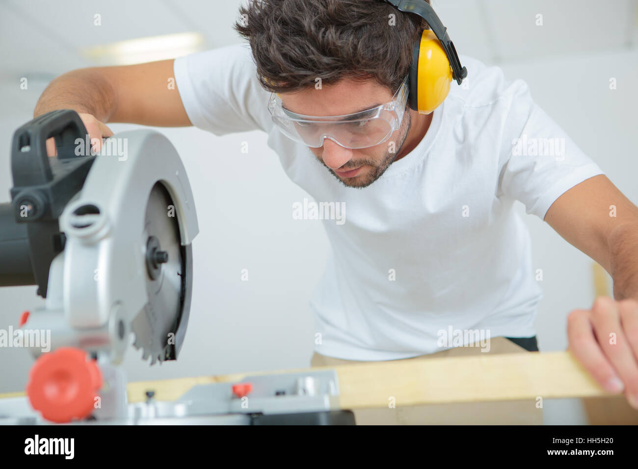 cutting a wood Stock Photo - Alamy