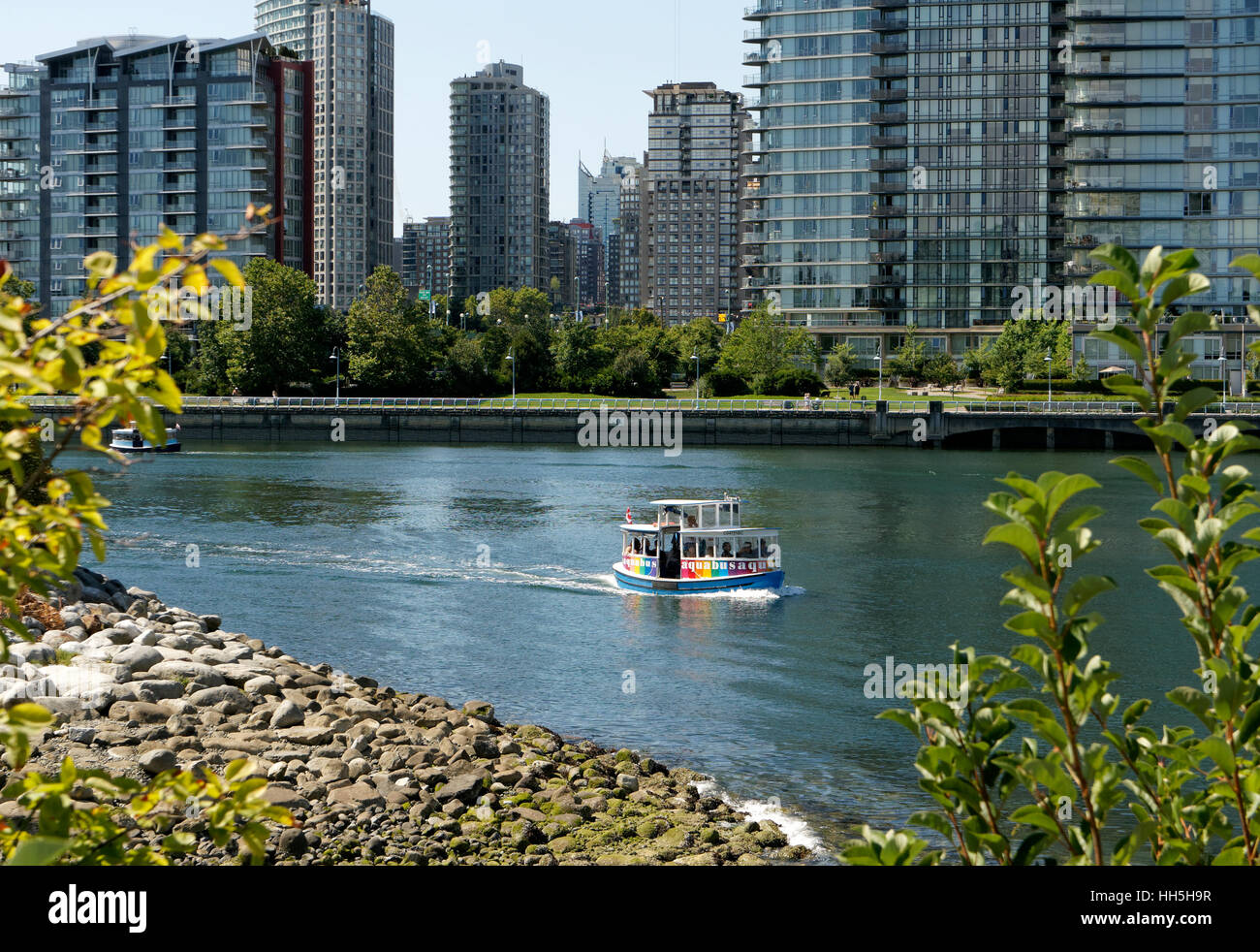 An aquabus ferry sailing on False Creek, Vancouver, British Columbia ...