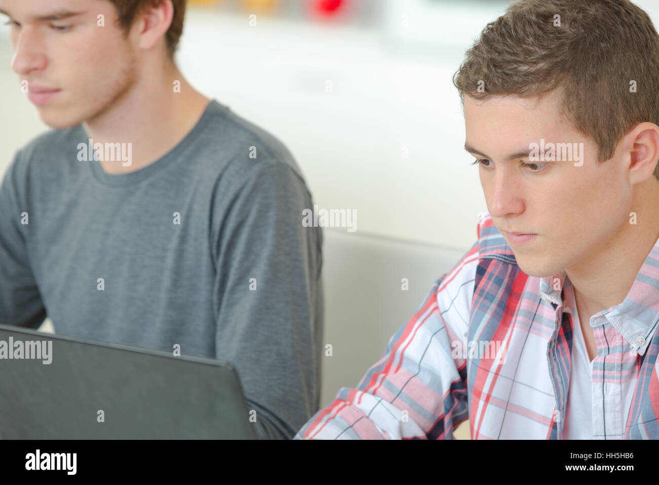 Two guys at computer hi-res stock photography and images - Alamy