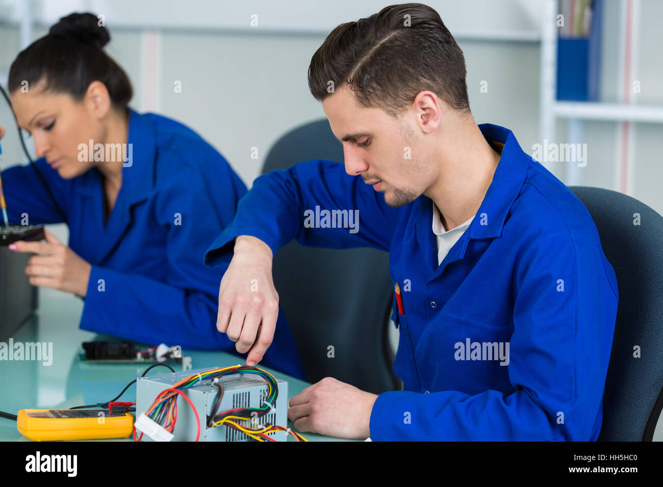 two electronic students in class Stock Photo - Alamy