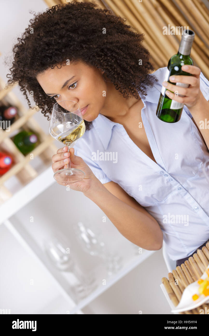 beautiful young lady alone in restaurant Stock Photo - Alamy