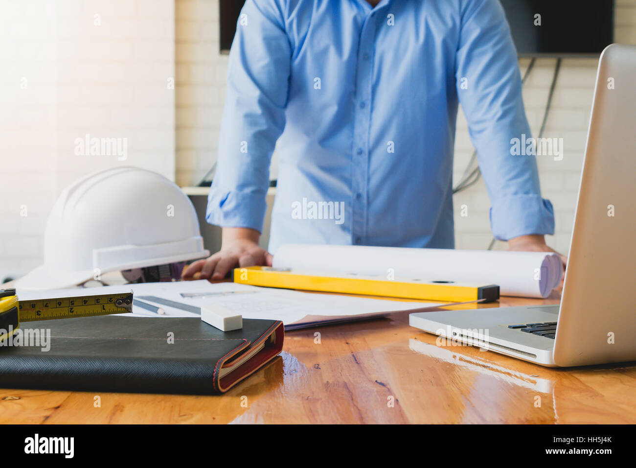 Architect concepts, Architects working with blueprints in the office ...