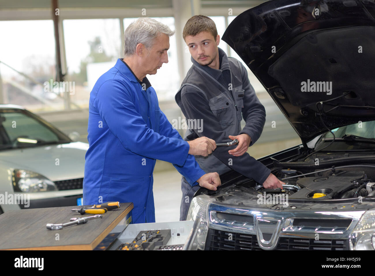trainee mechanic at work Stock Photo - Alamy