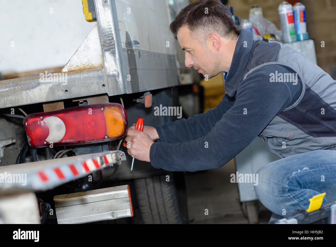 portrait of male mechanic at work in the garage Stock Photo - Alamy