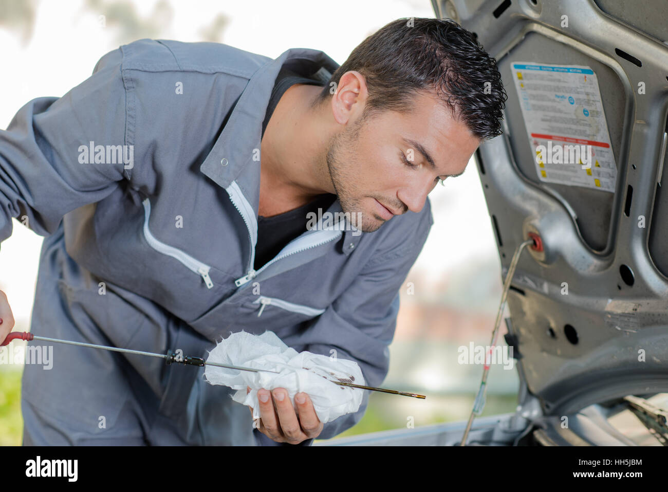 checking the oil Stock Photo - Alamy