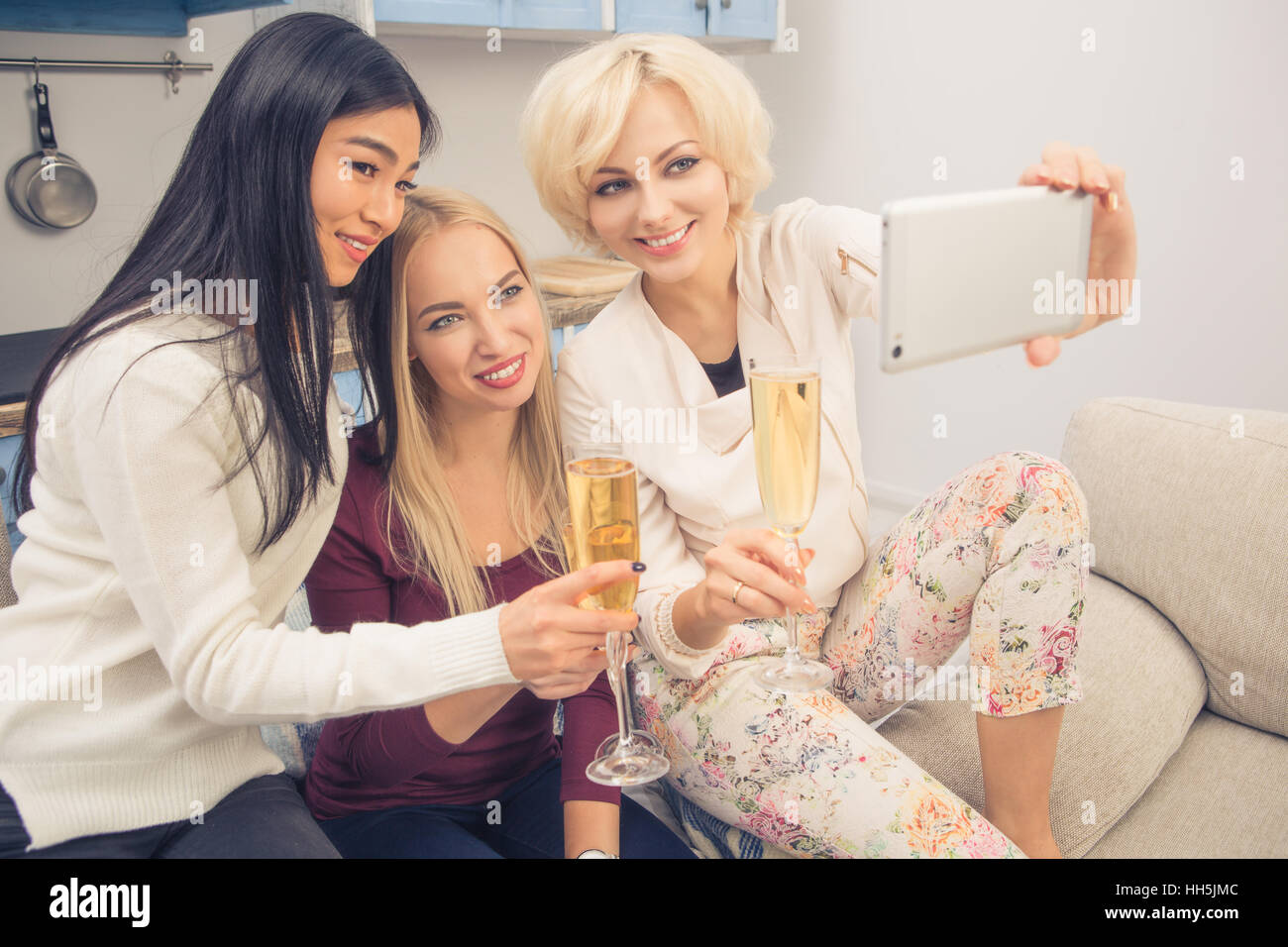 Friends girls having party at home Stock Photo - Alamy