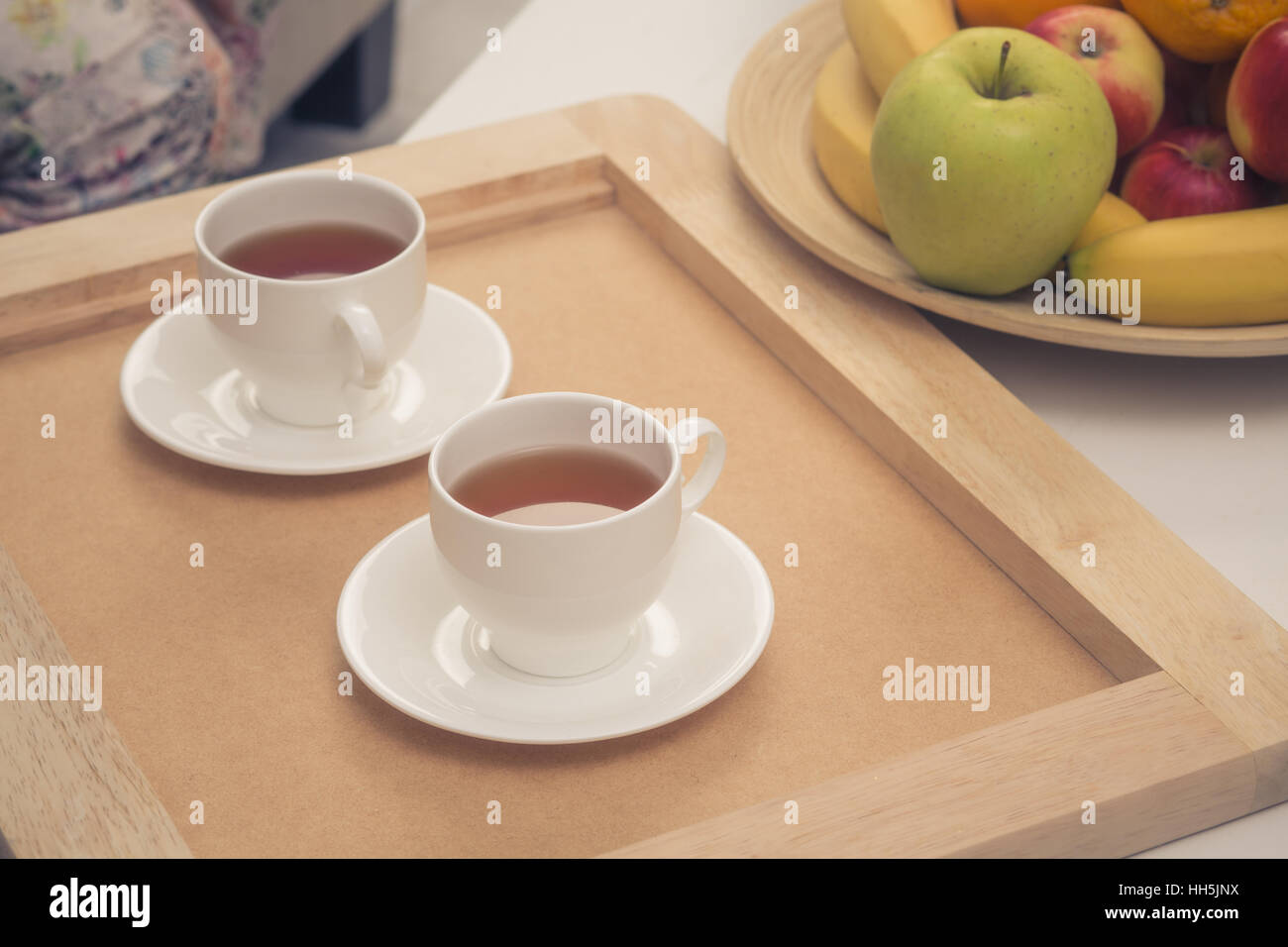 Two cups of tea on tray Stock Photo - Alamy