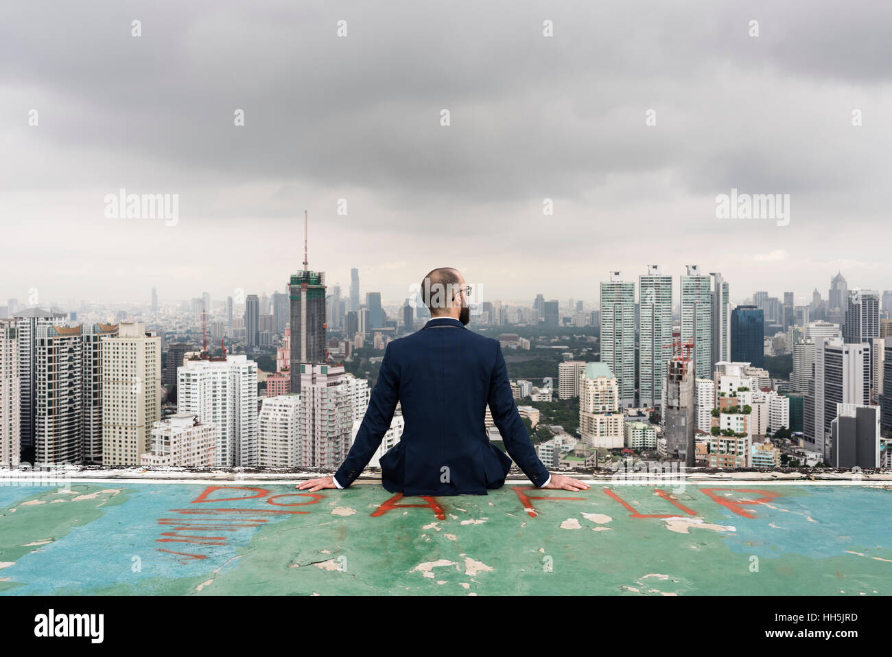 Business Person Sitting Rooftop Concept Stock Photo - Alamy