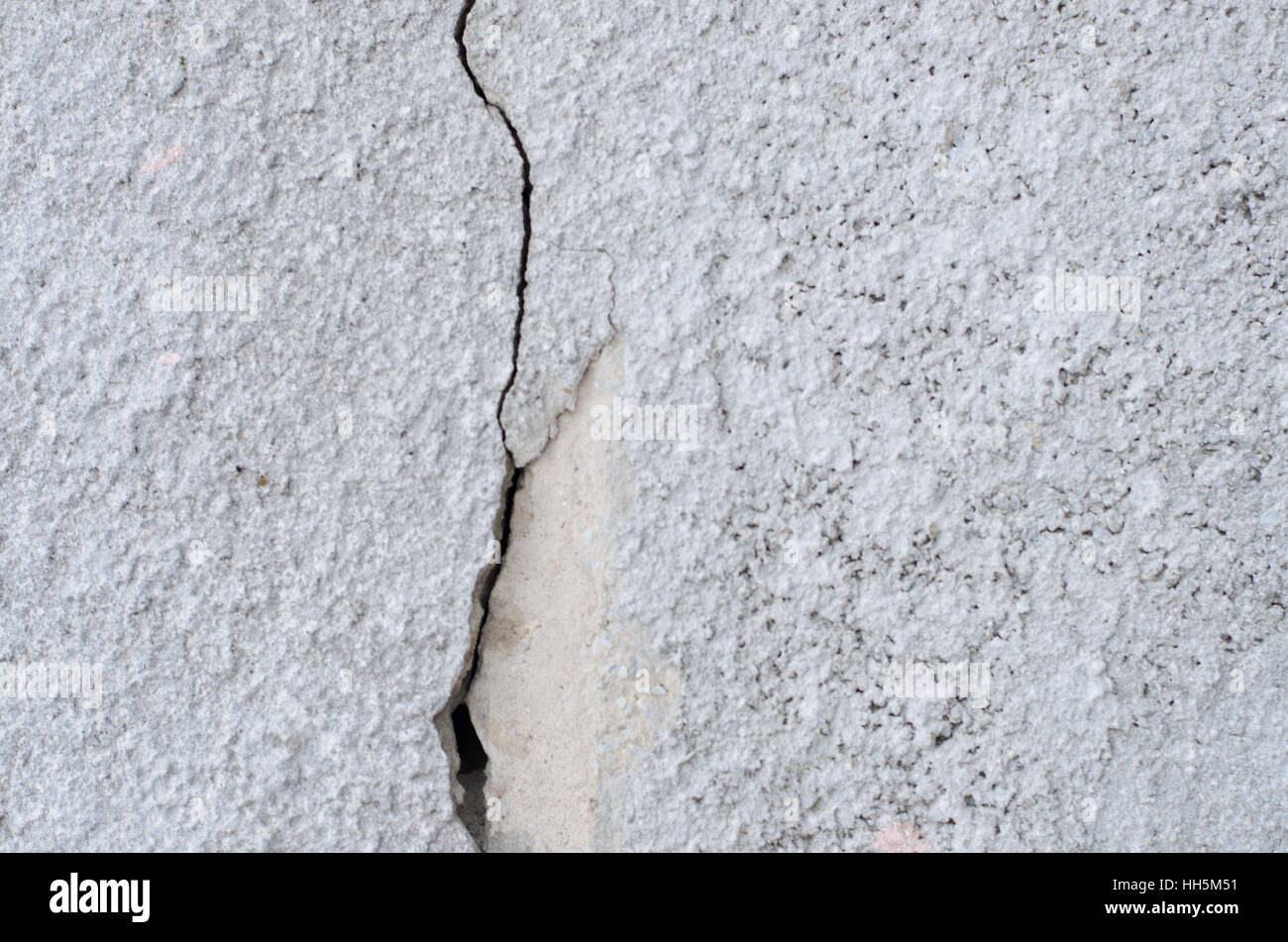 crack on the light wall texture close-up background Stock Photo - Alamy