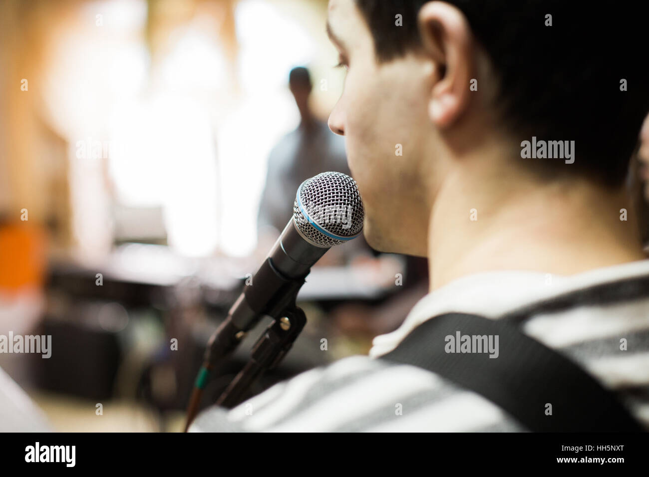 Speaker or singer at Business Conference and Presentation. Audience at ...