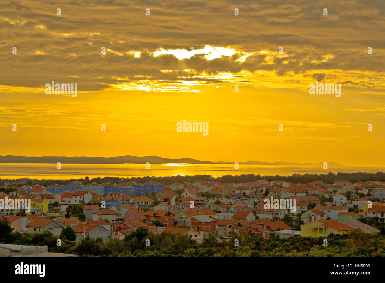 Golden sunset over town of Zadar, Dalmatia, Croatia Stock Photo - Alamy
