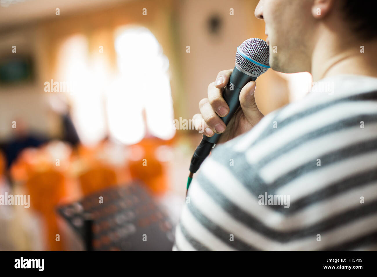 Speaker or singer at Business Conference and Presentation. Audience at ...