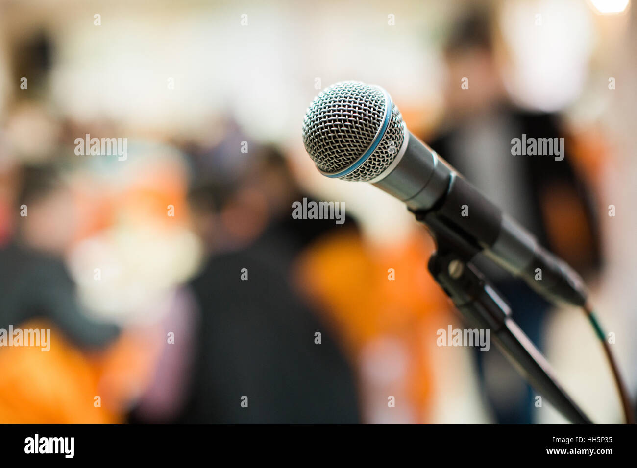 microphone in concert hall or conference room or on stage Stock Photo ...