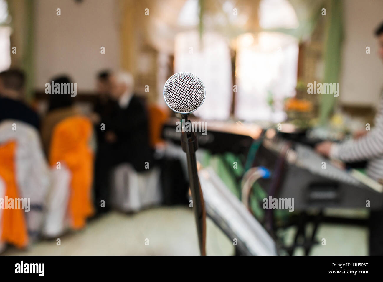 microphone in concert hall or conference room or on stage Stock Photo ...