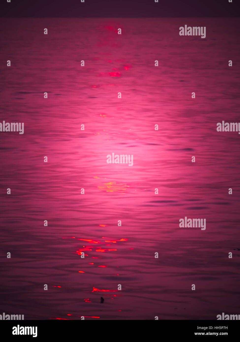 Sea water in the pink color Stock Photo - Alamy