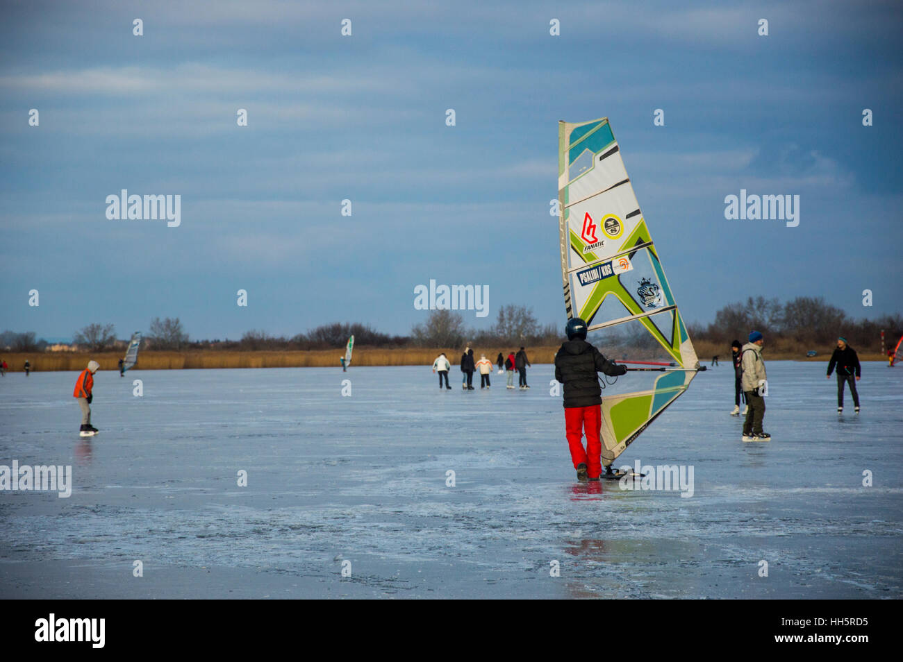 ice sail ice surfer ice skaters on the lake Stock Photo - Alamy