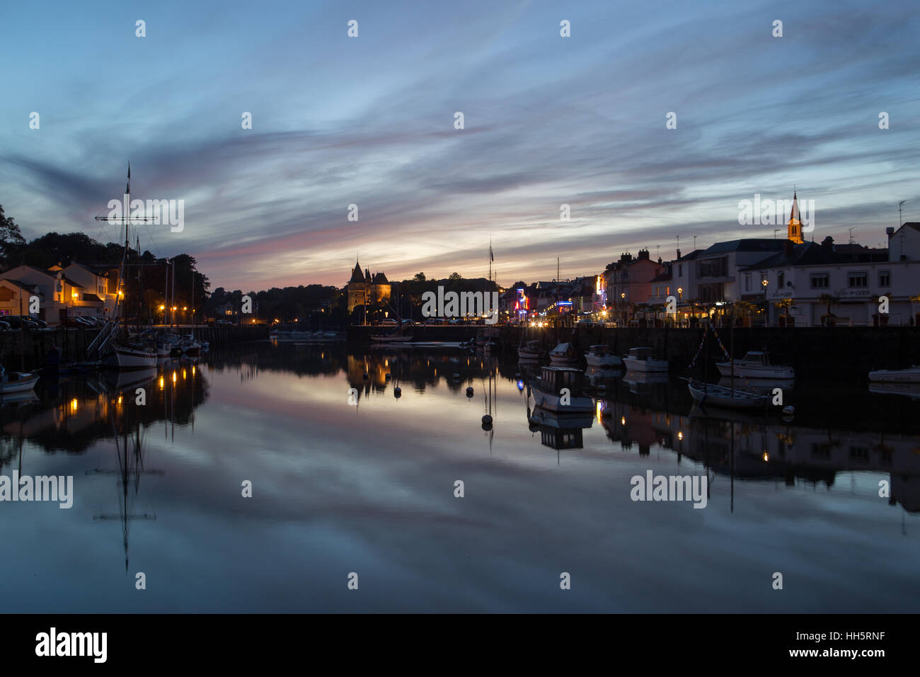 The Chateau and harbour at Pornic Loire Atlantique France at sunset ...